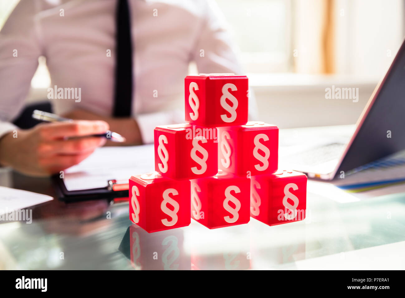 Close-up Of Red Cubic Blocks With Paragraph Symbols Arranged In Pyramid ...