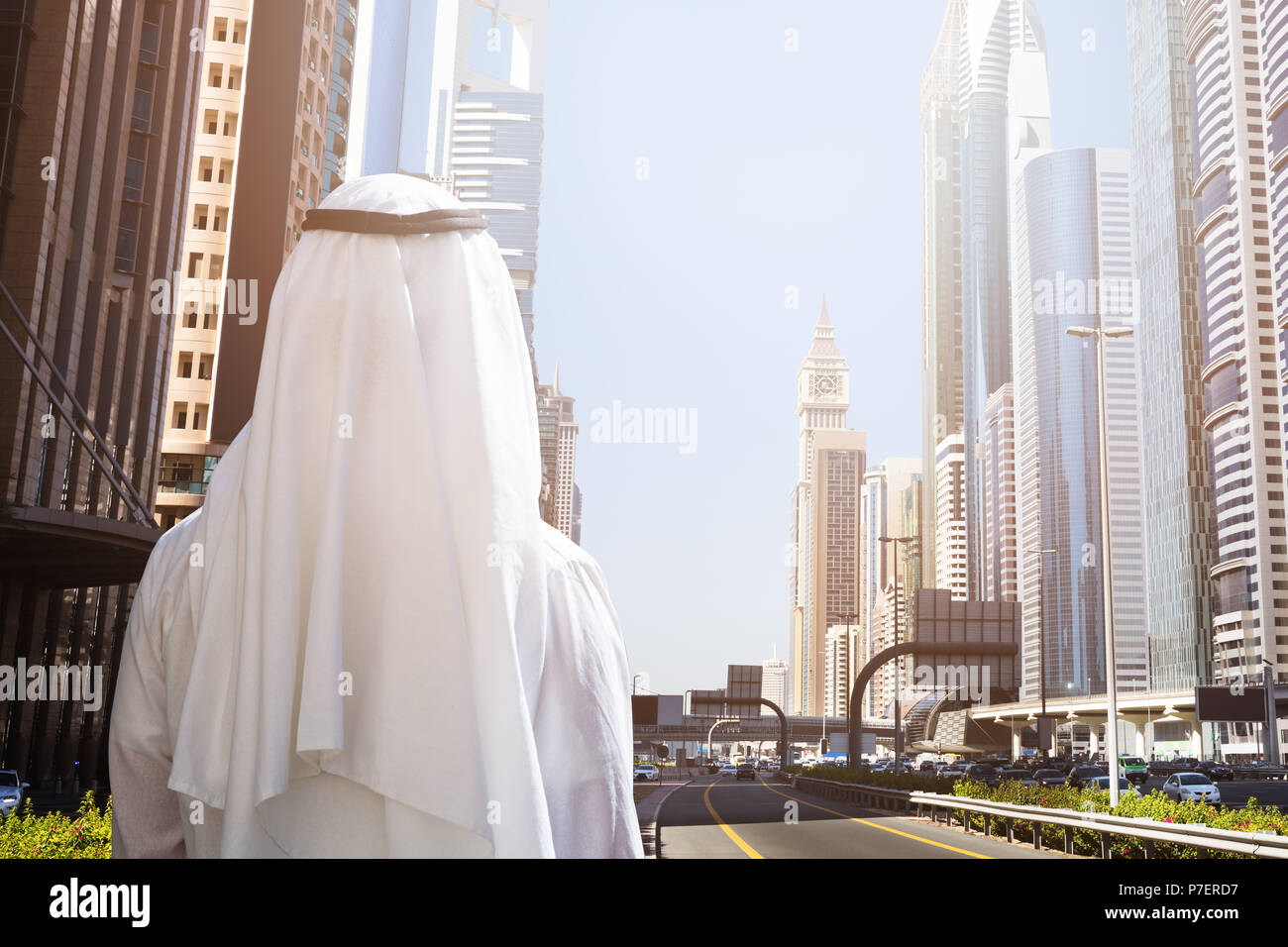 Rear View Of A Arabic Man Standing In Front Of Dubai Cityscape Stock ...