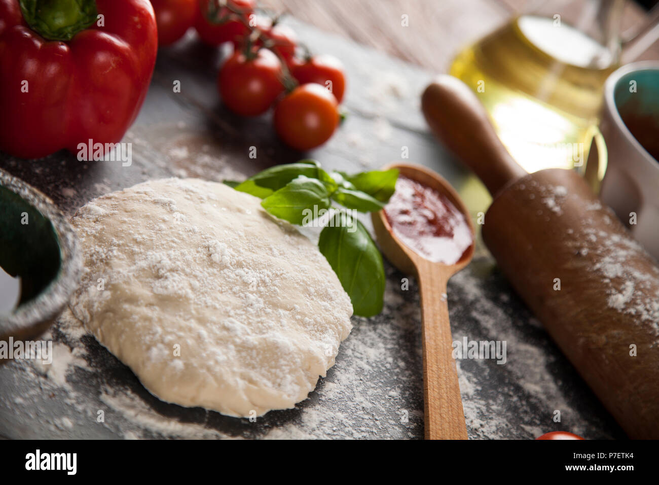 Homemade italian pizza preparation Stock Photo - Alamy