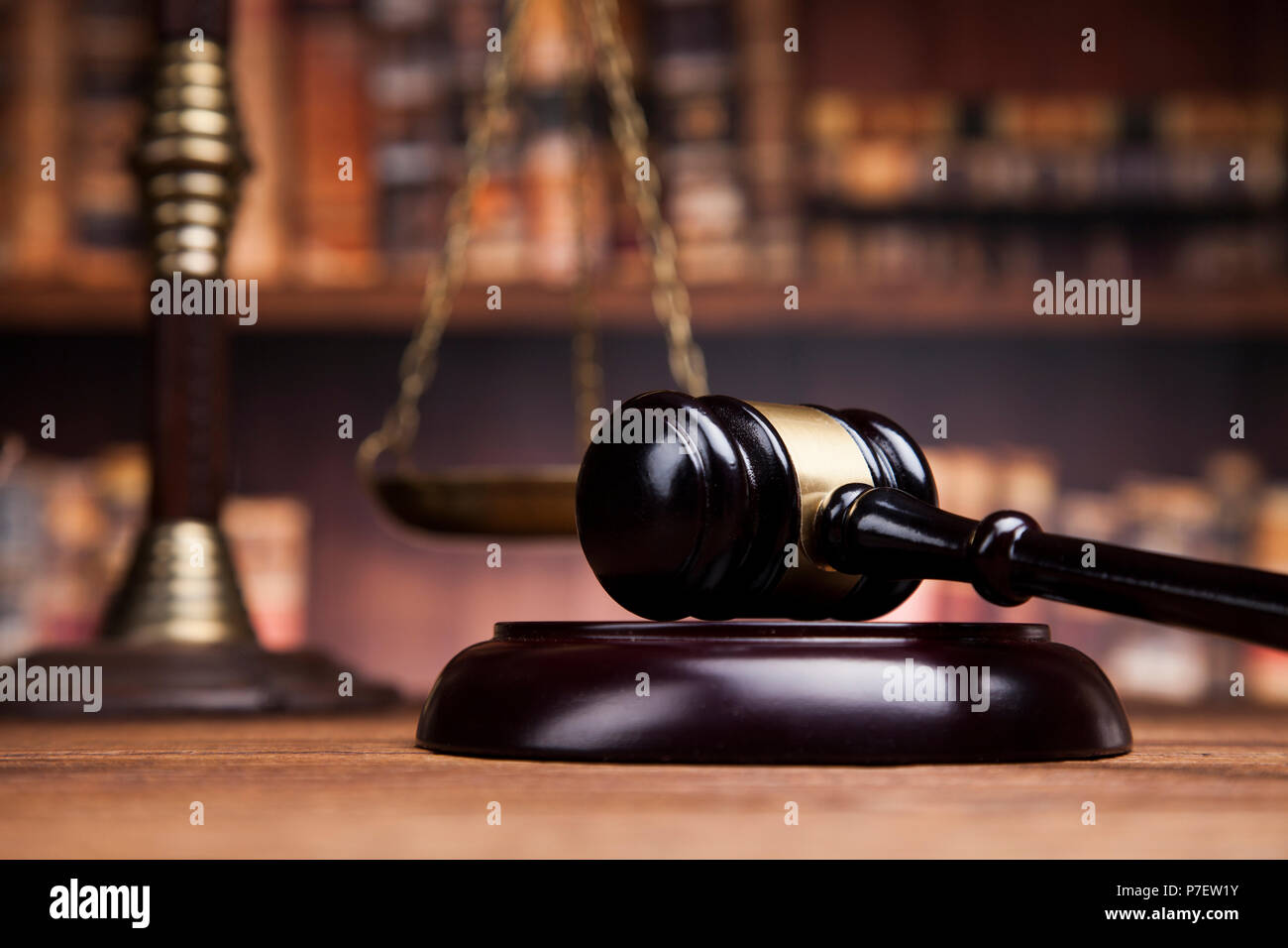 law theme, mallet of the judge, justice scale, books, wooden desk Stock Photo - Alamy