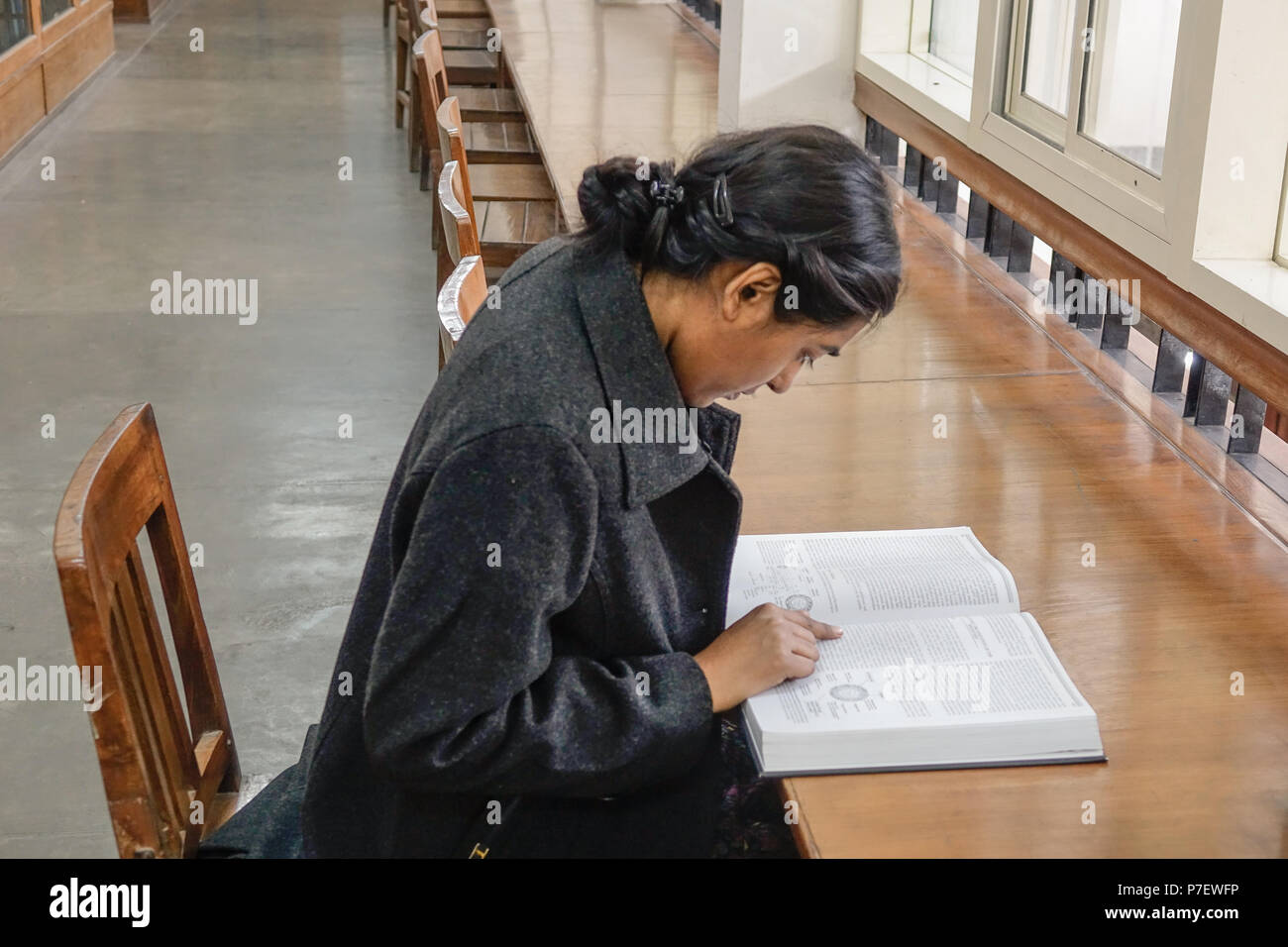 Indian woman studying hi-res stock photography and images - Alamy