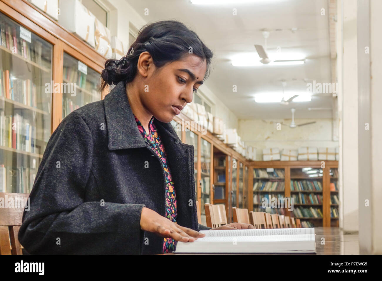 Indian woman studying hi-res stock photography and images - Alamy