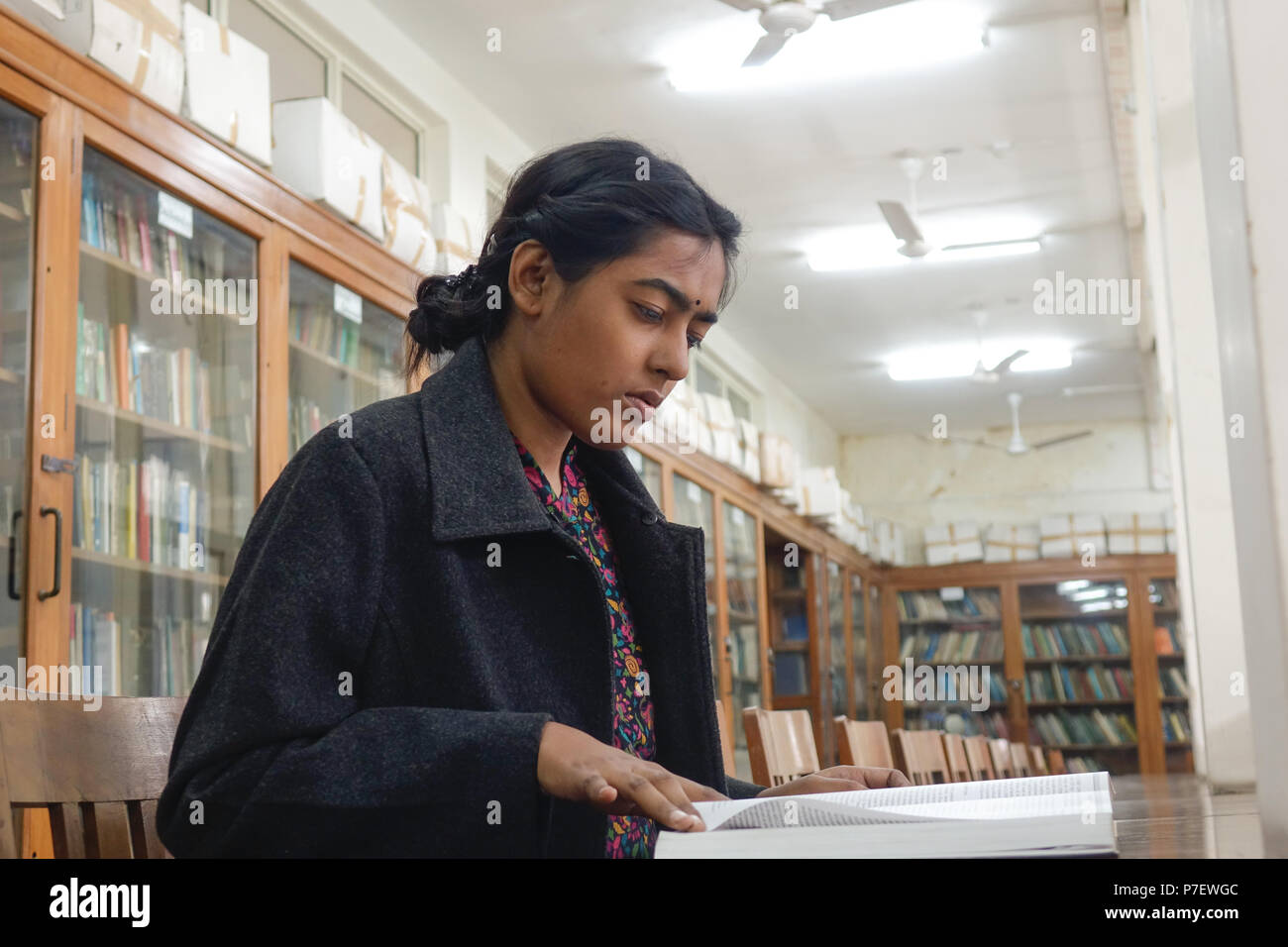 Indian woman studying hi-res stock photography and images - Alamy