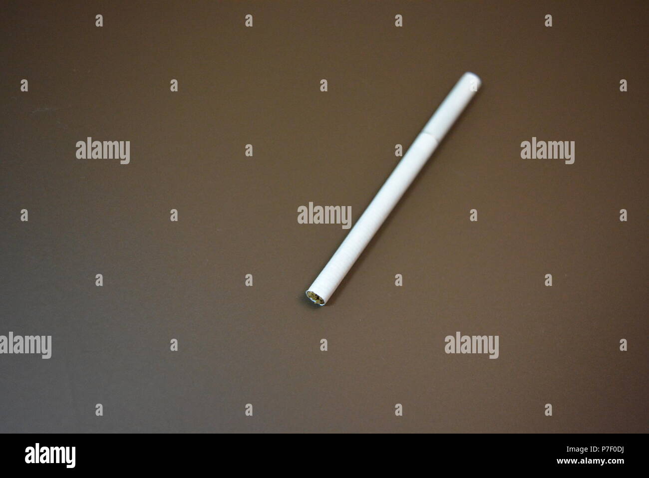 One thin cigarette on hi-res stock photography and images - Alamy