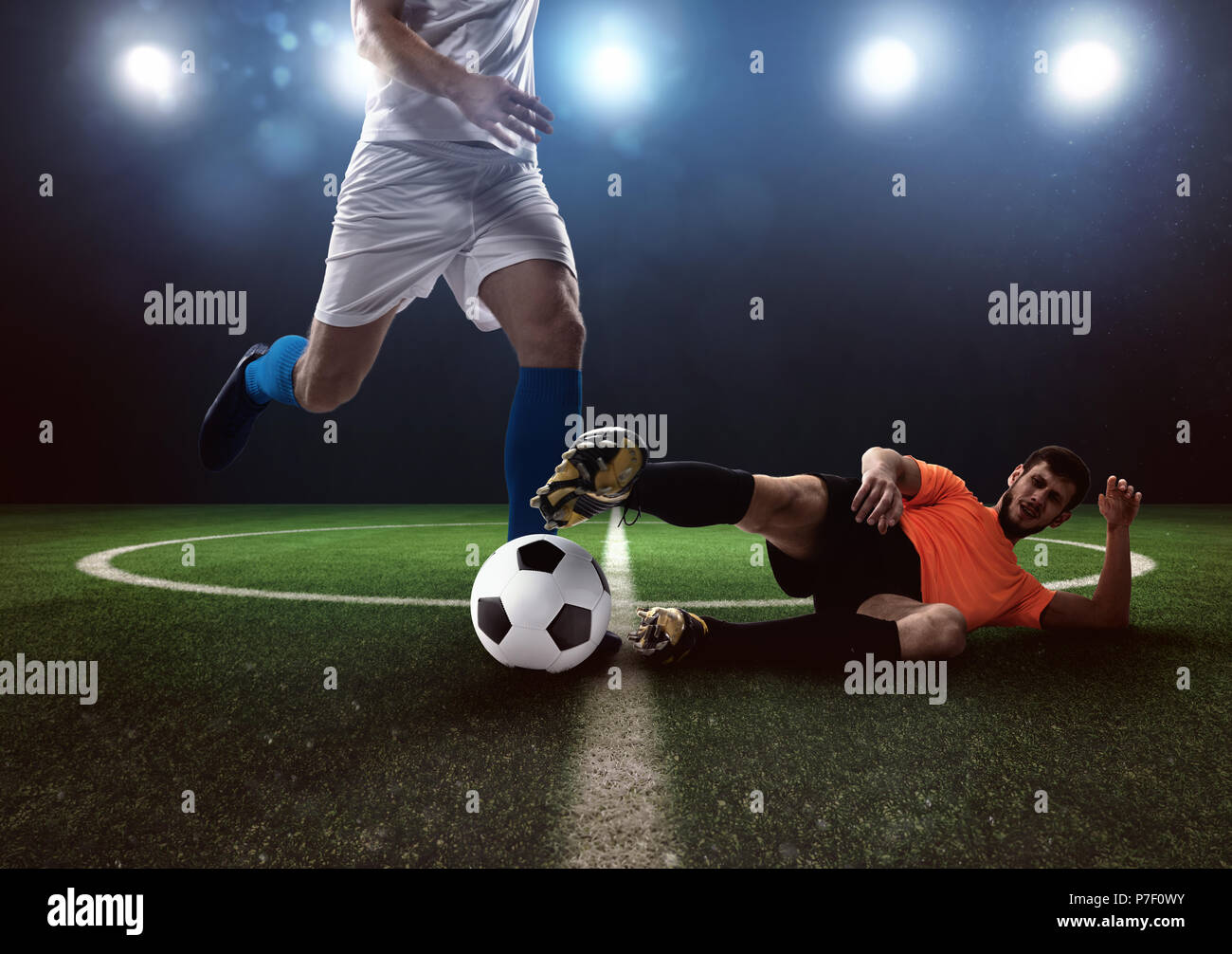 Soccer conflict scene between players at the stadium Stock Photo - Alamy