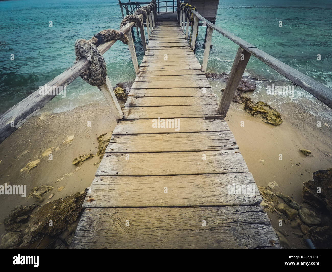 Wooden pier on beach hi-res stock photography and images - Alamy