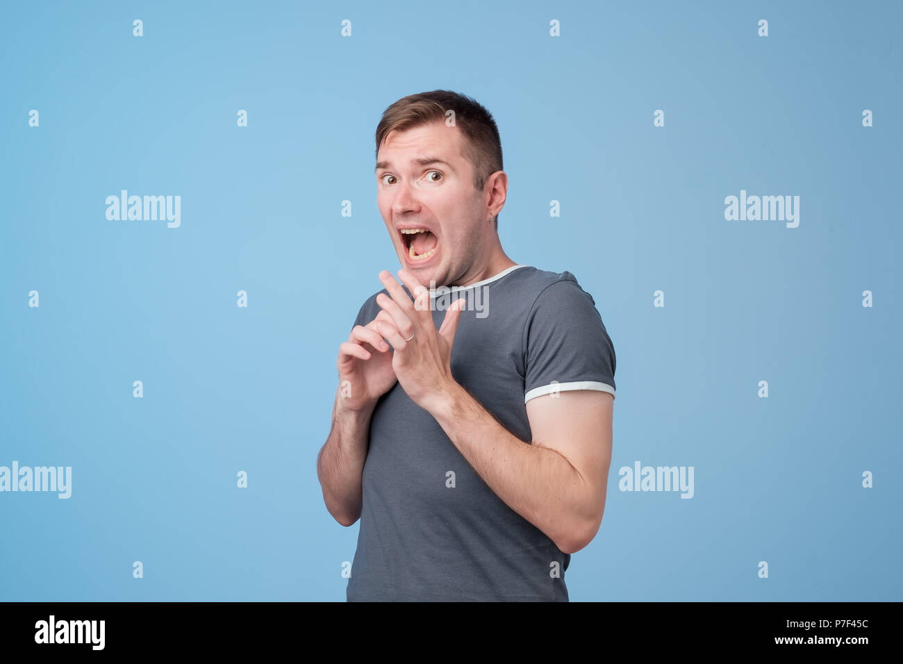 Scared male face hi-res stock photography and images - Alamy