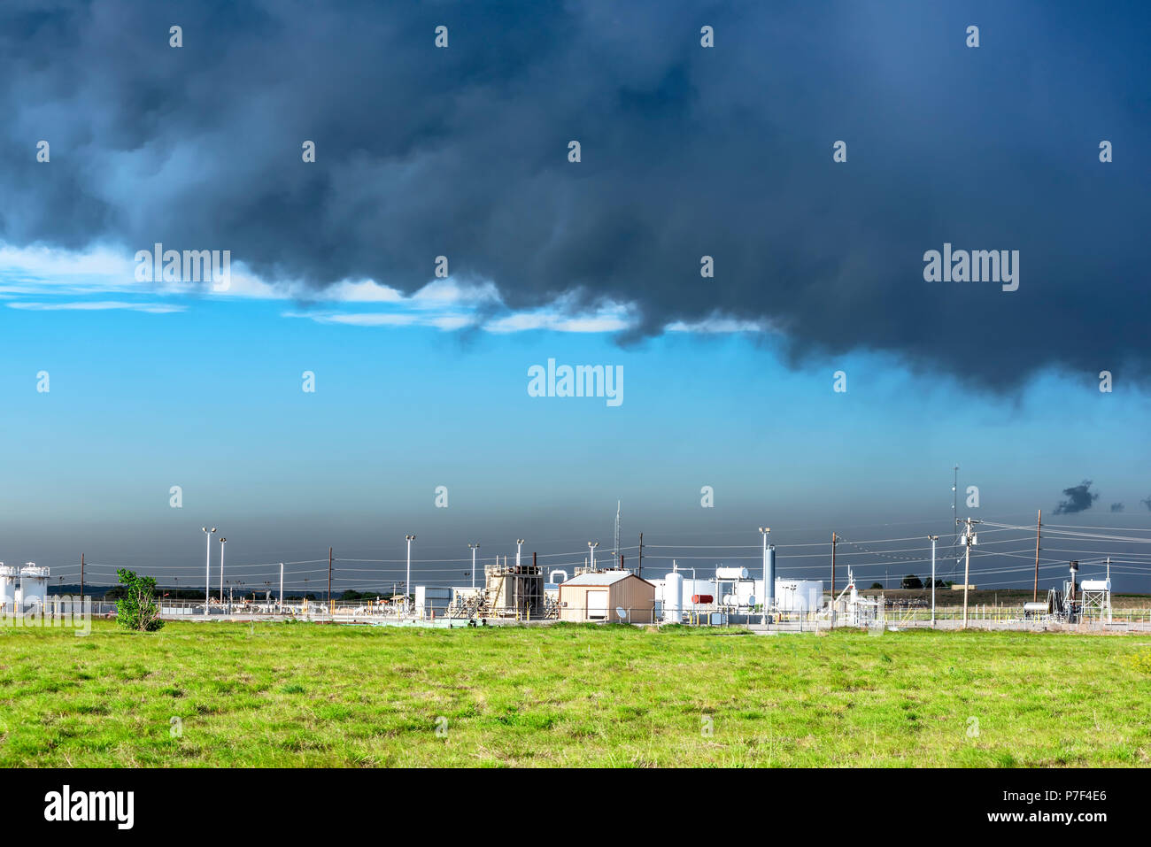 The bottom of a tornadic supercell moves over a small utilities ...