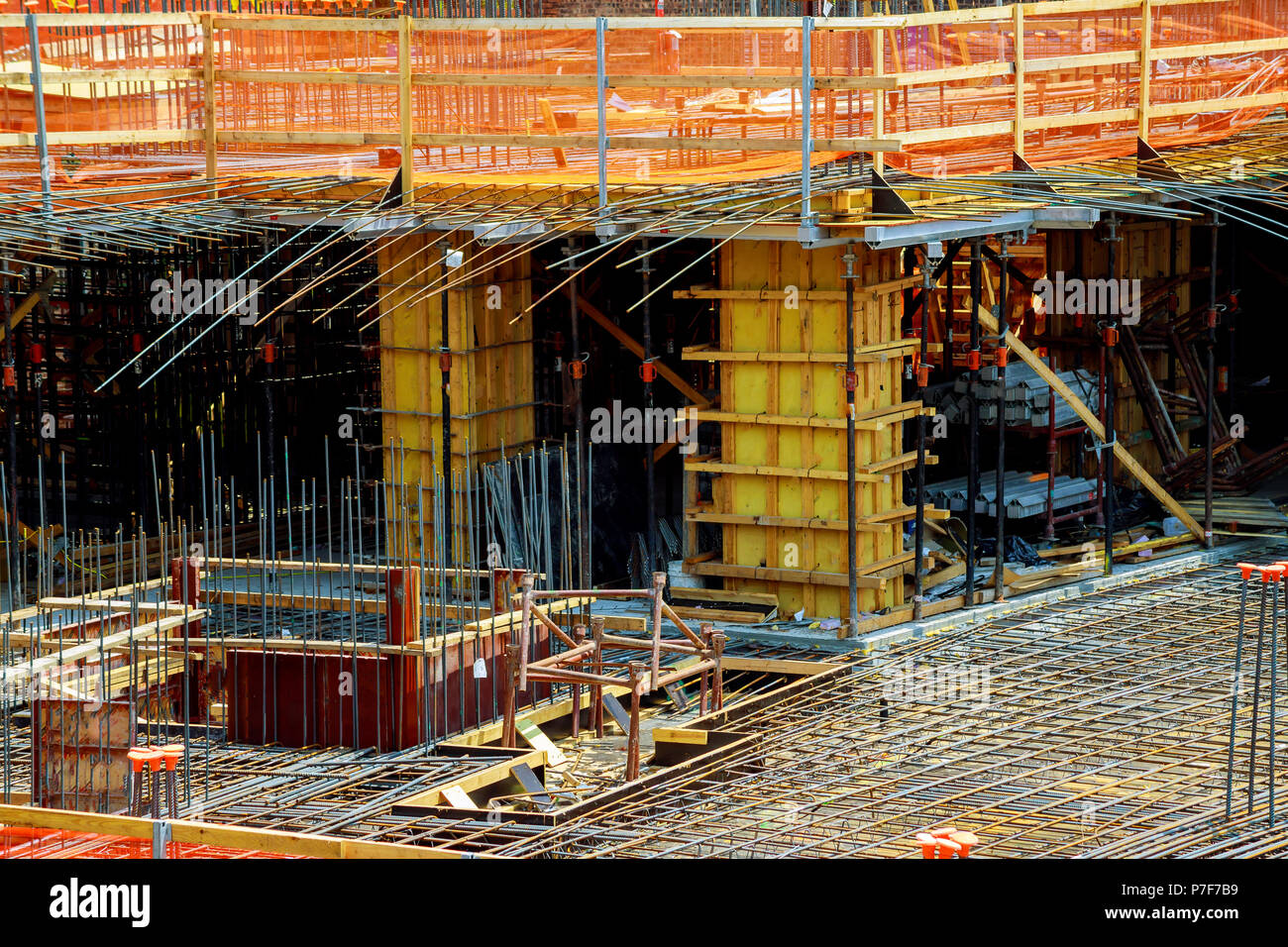 close up view of reinforcement of concrete with metal rods connected by ...