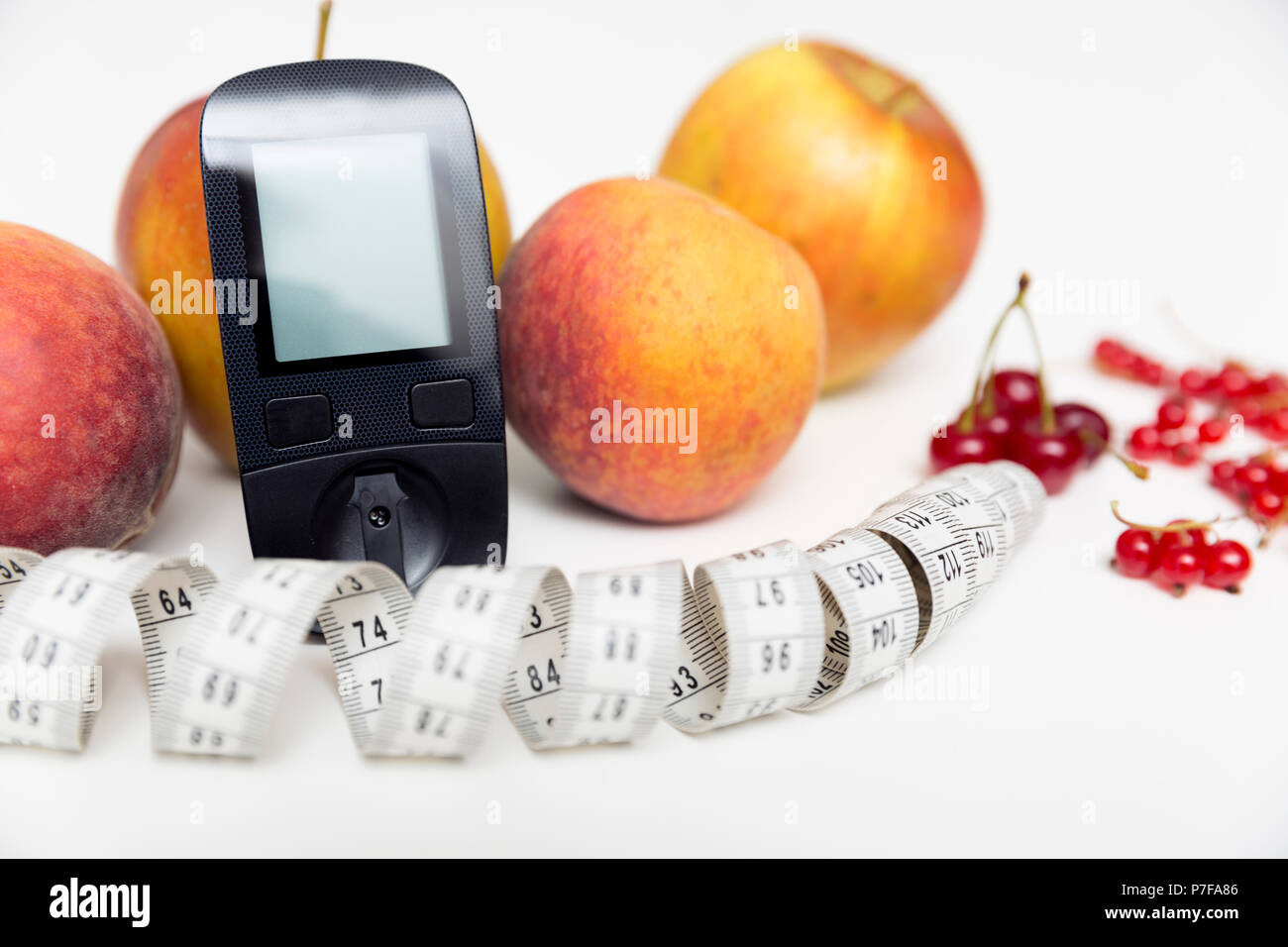 Diabetes monitor, diet and healthy food eating nutritional concept with ...