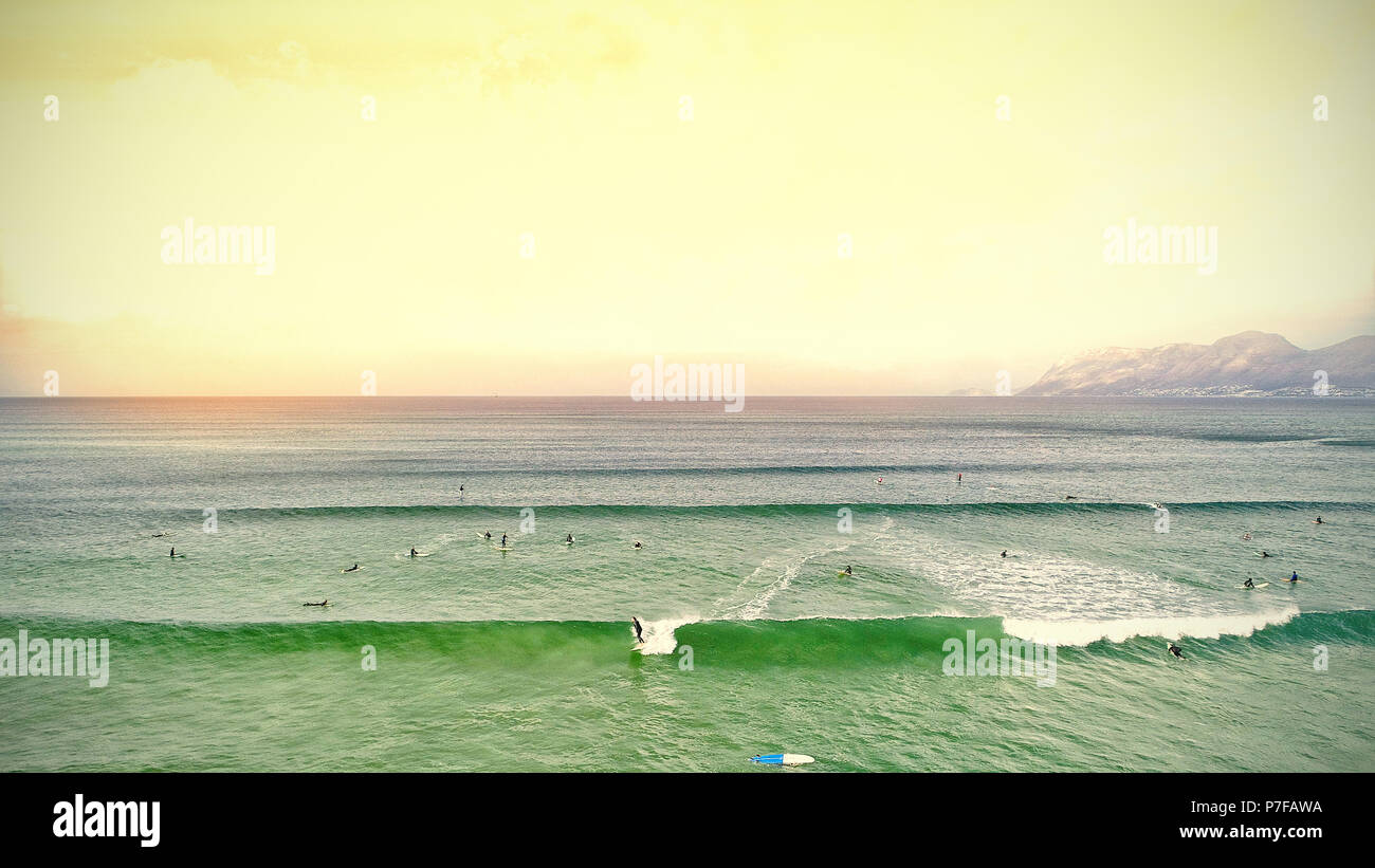 Blue ocean, Surfers in ocean, Areal view Stock Photo - Alamy