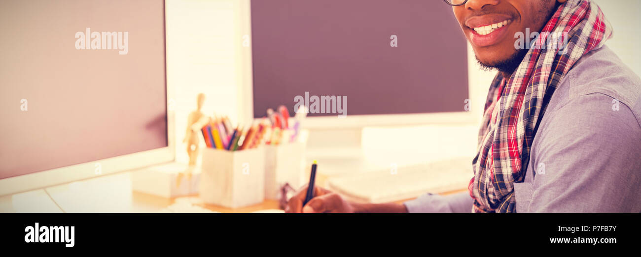 Portrait happy graphic designer hi-res stock photography and images - Alamy