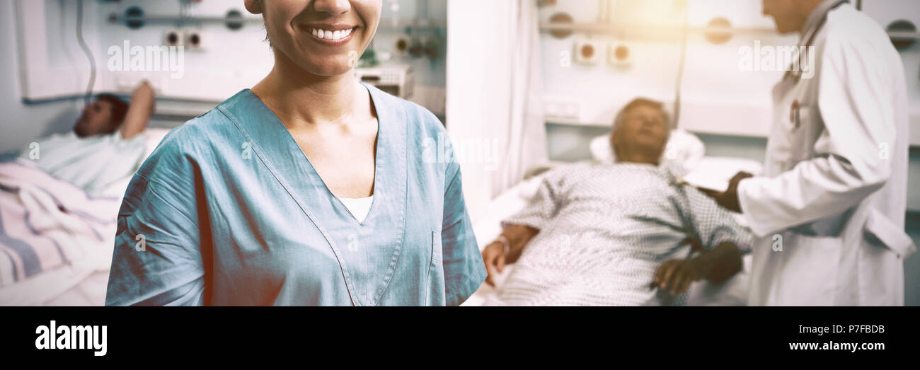 Nurse tending patient hi-res stock photography and images - Alamy