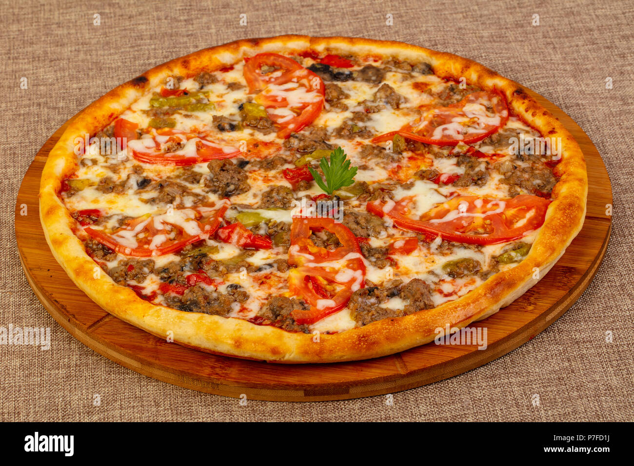 Pizza with minced meat and cheese Stock Photo - Alamy