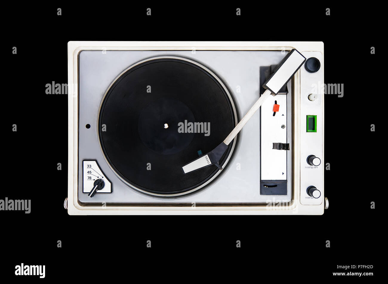 The old Soviet vinyl player isolated on black background. turntable ...