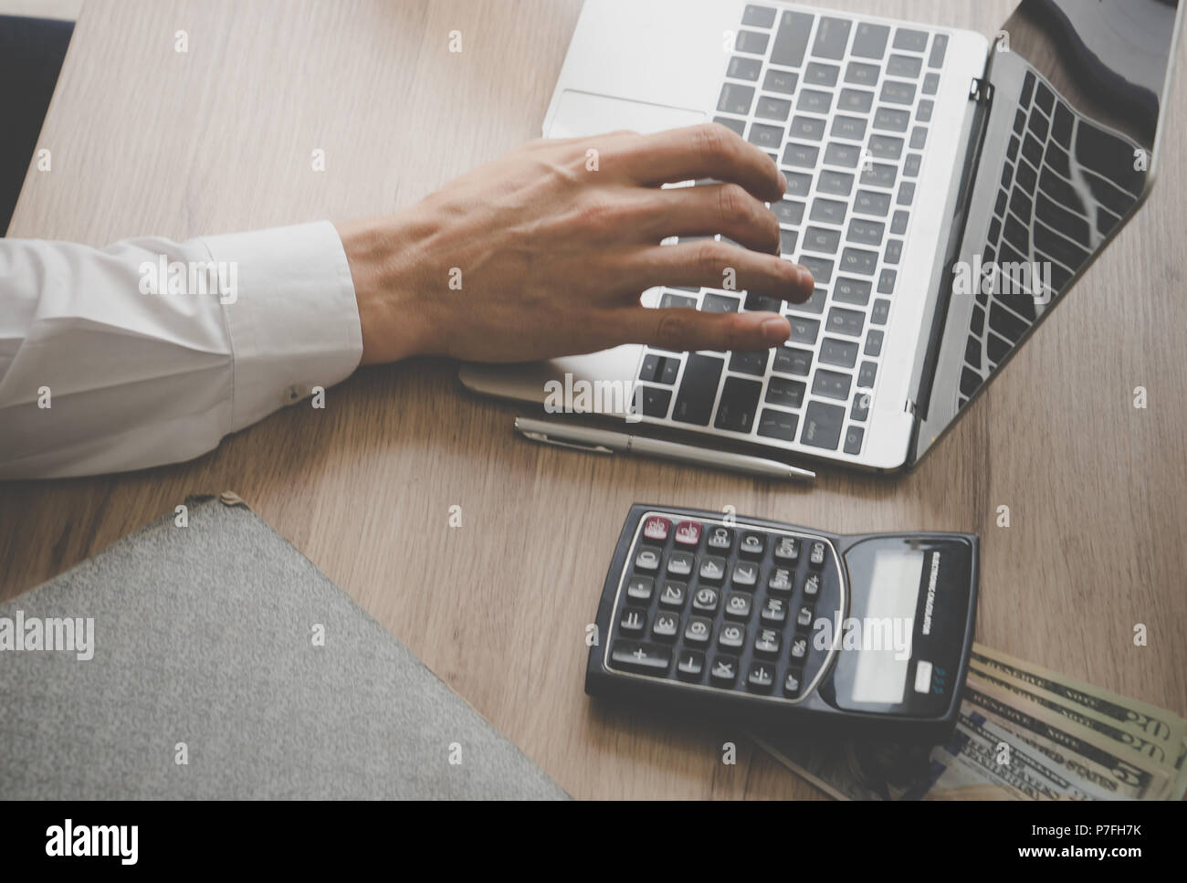 Causal male accounting worker hand using Computer laptop Stock Photo ...