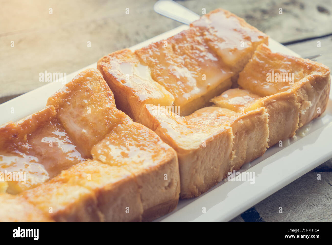 Thai Baked Toast with milk and sugar Stock Photo - Alamy