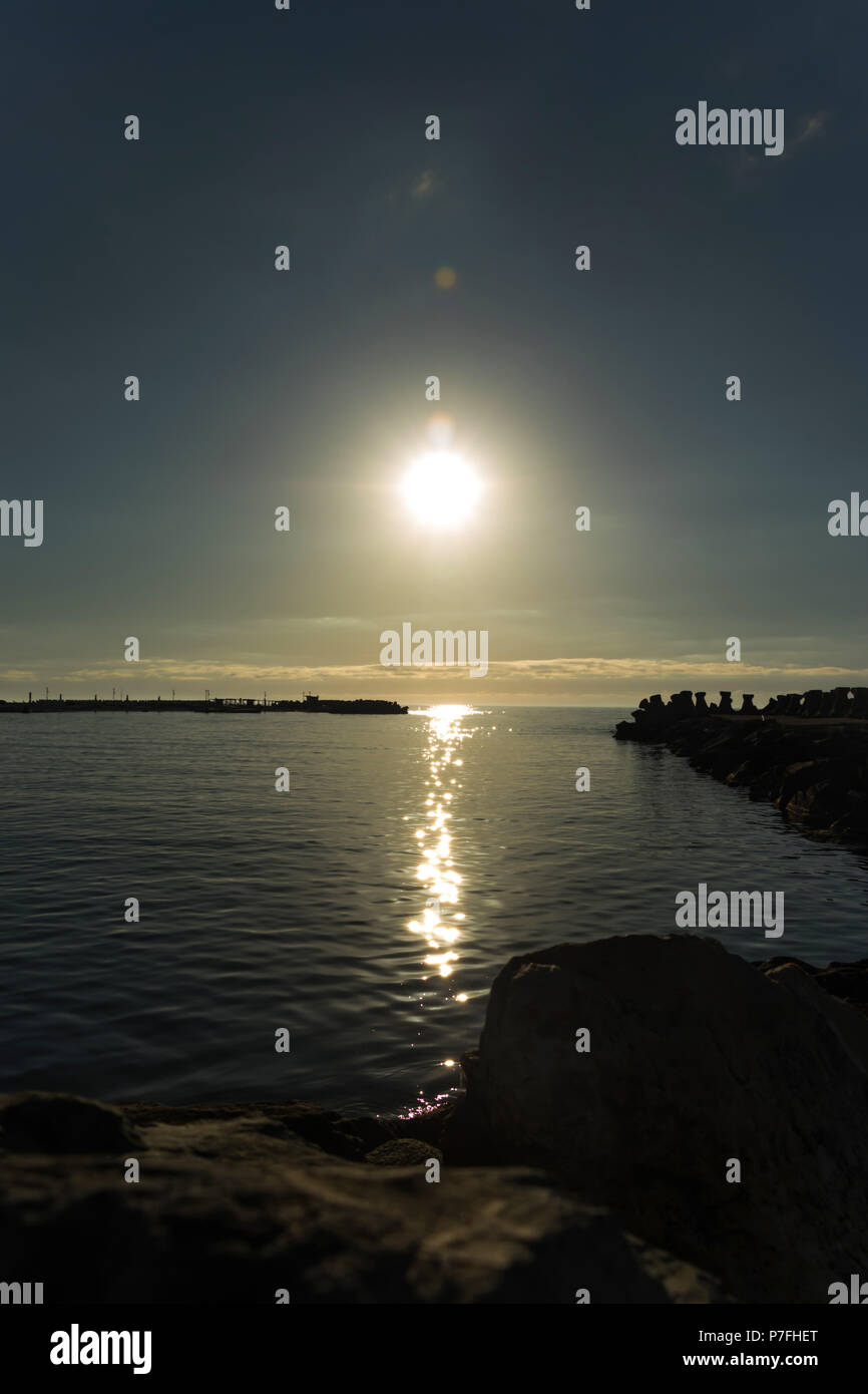 Bright yellow sun reflected in hi-res stock photography and images - Alamy