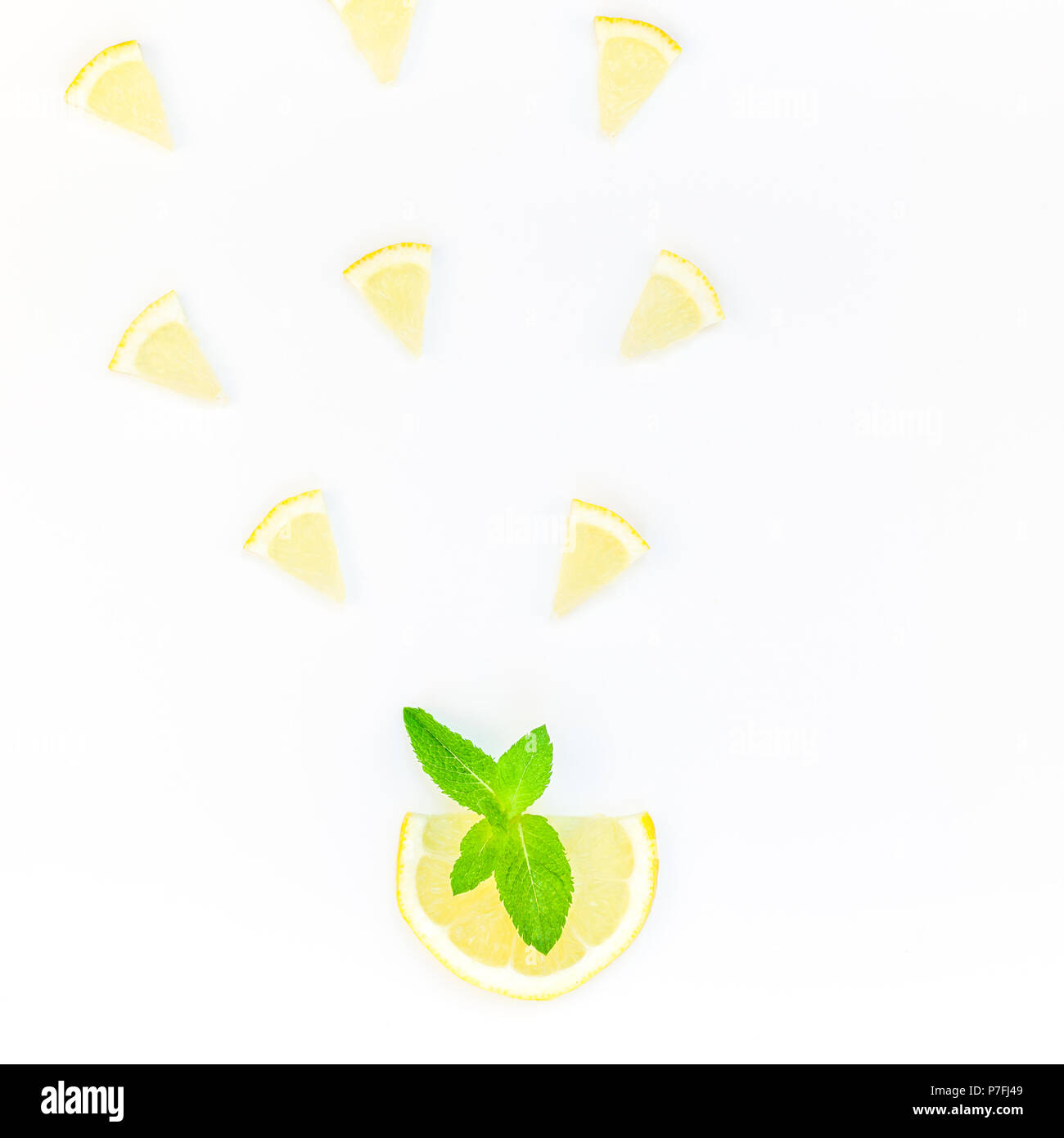 Square flatlay overhead top view citrus lemon slices and mint herbs ...