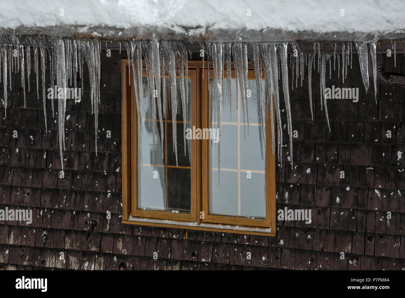 Old window with icicles, Eastern Townships, Potton, Quebec, Canada ...