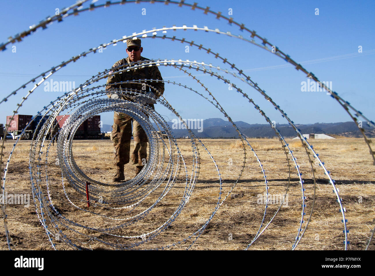 Arizona Army National Guard Staff Sgt. Ricardo Ramos stretches out a ...