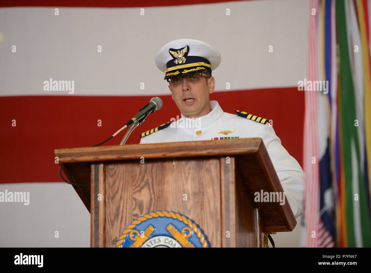 Capt. Jeremy Smith reads his orders to take command of Sector Columbia ...