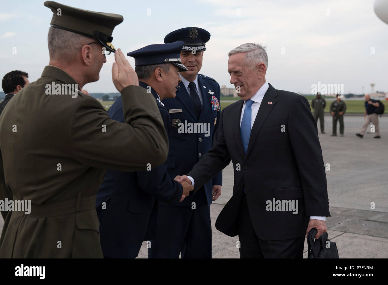 Secretary of Defense James N. Mattis is greeted by, from left, U.S ...