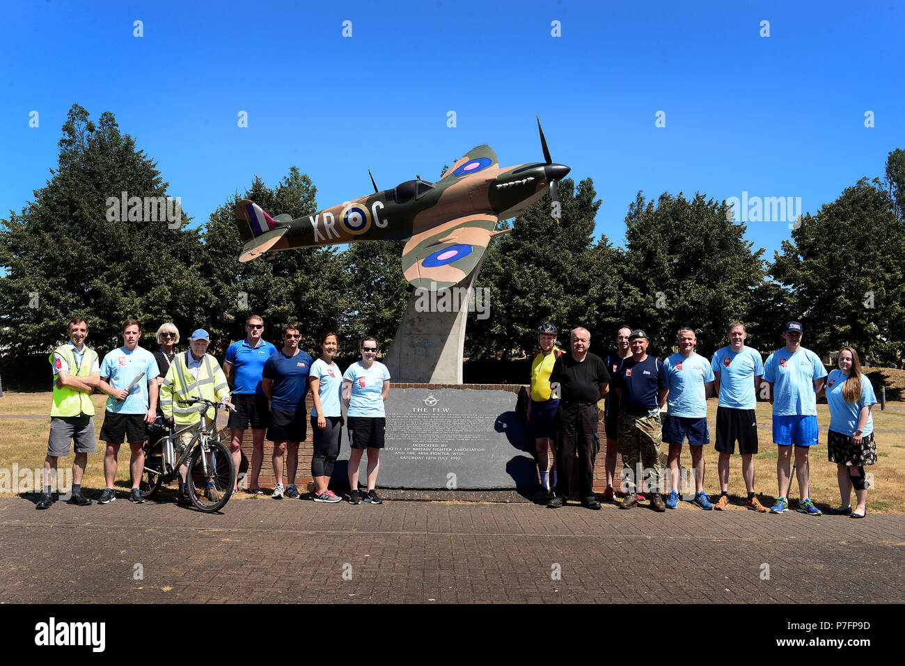 Participants of the Royal Air Force 100 Baton relay pose for a photo in ...