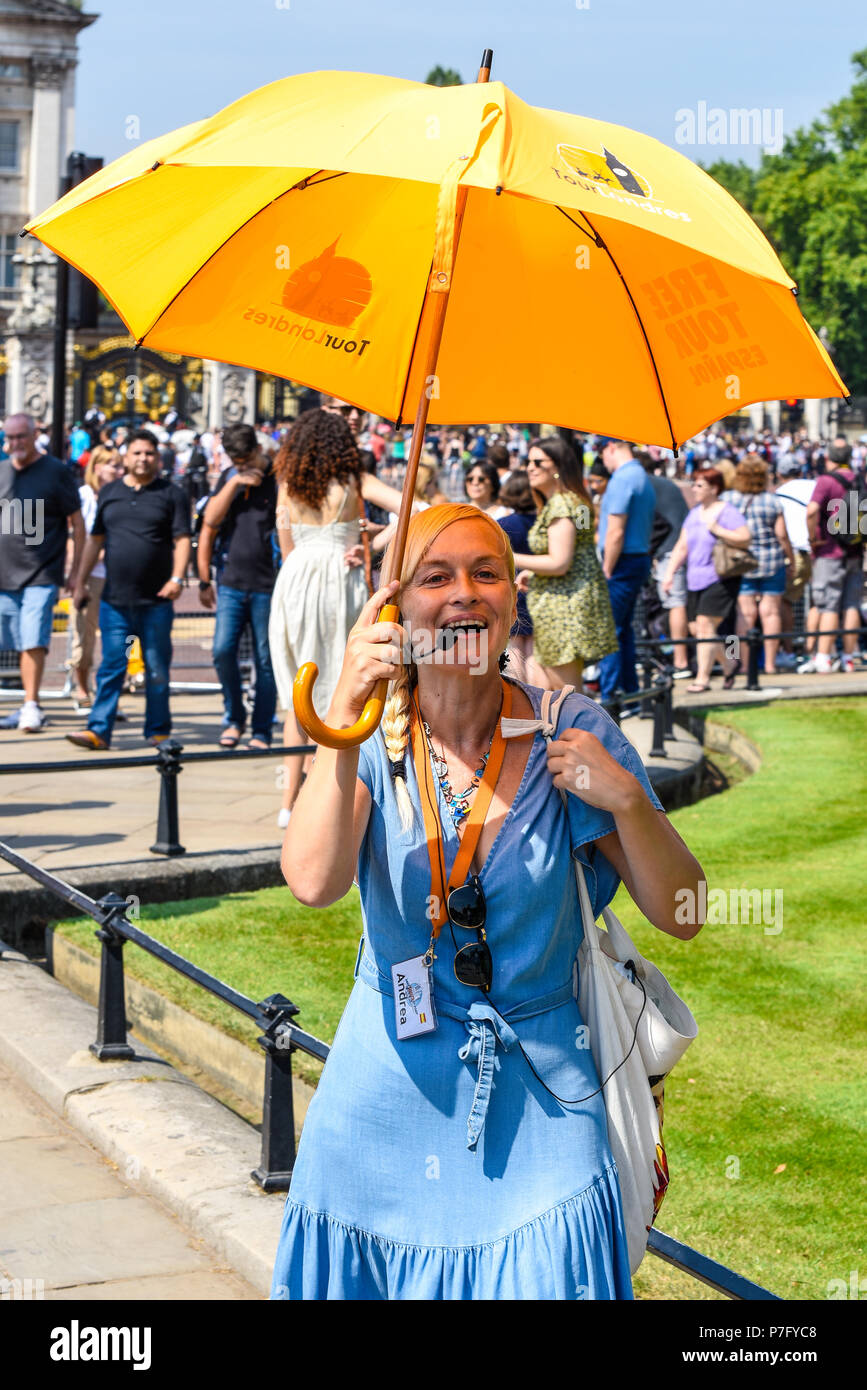 Female guide with bright umbrella hi-res stock photography and images ...