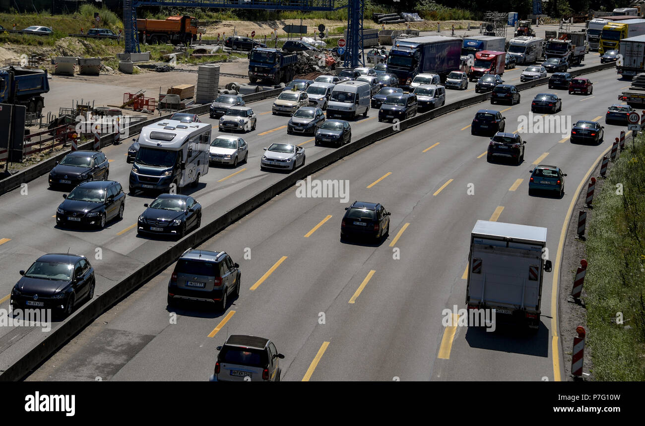 06 July 2018, Germany, Hamburg: Cars forming a traffic jam by a ...
