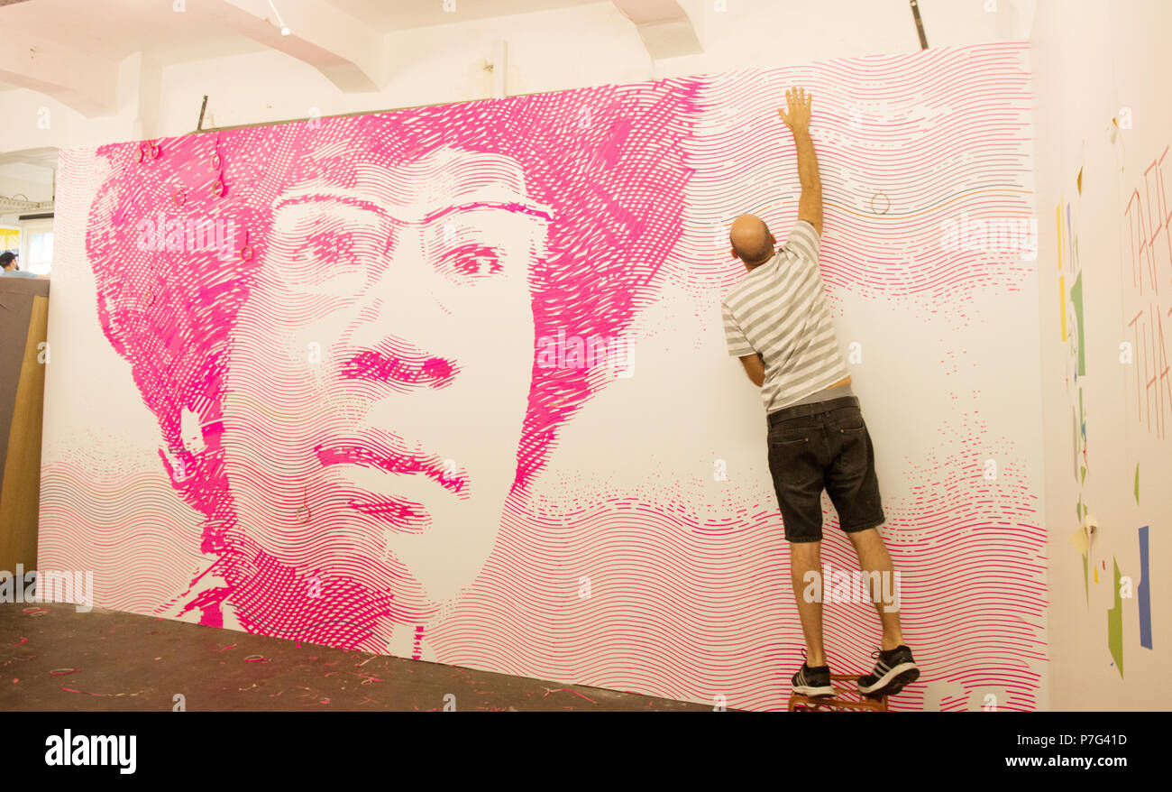 Germany, Berlin. 6th July, 2018. The tape artist Carlo Galli from Italy ...