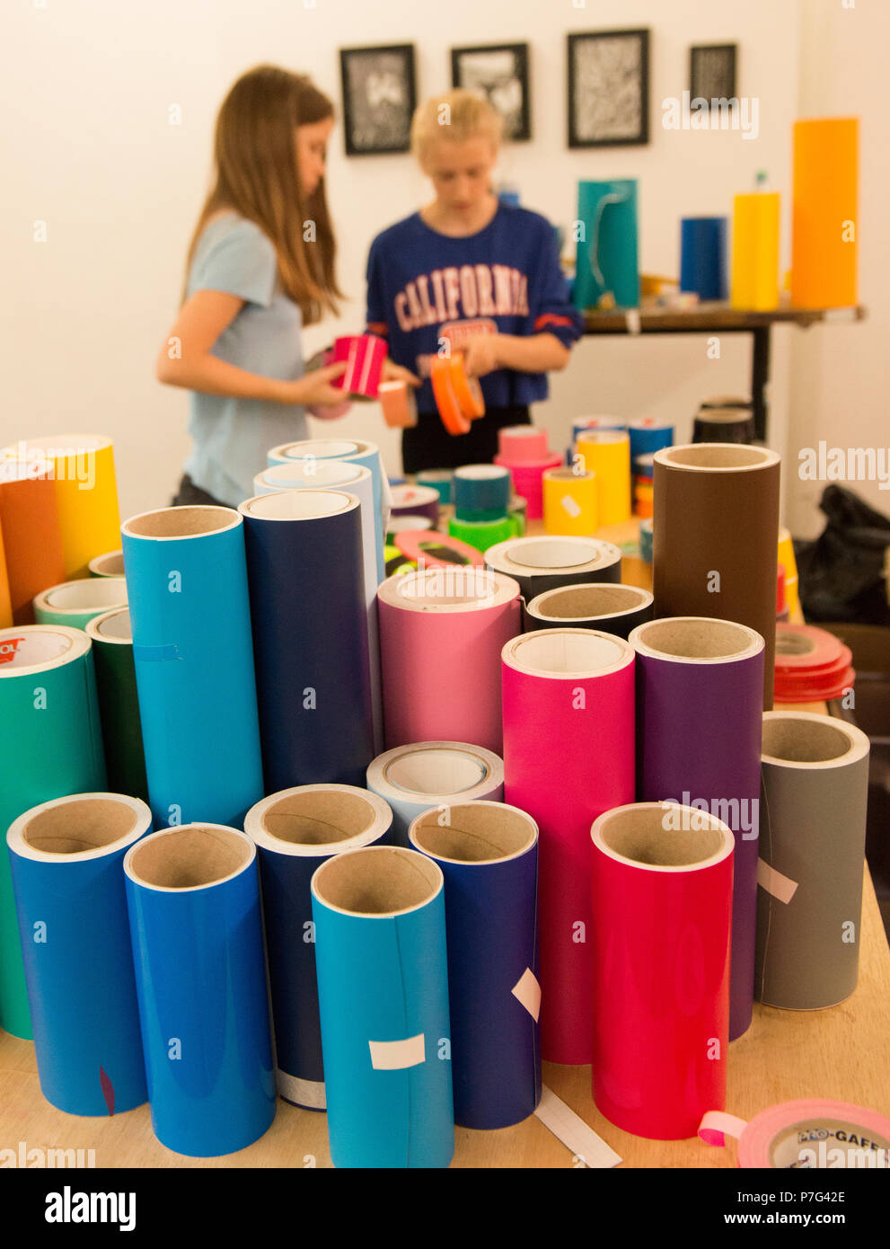 Germany, Berlin. 6th July, 2018. Students help by sorting rolls of tape ...
