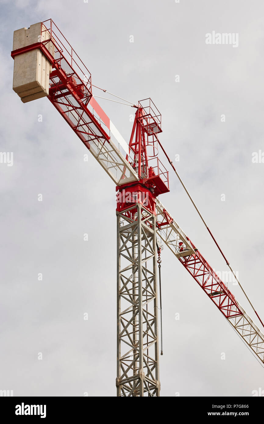 Crane machinery structure under a white sky. Construction industry ...