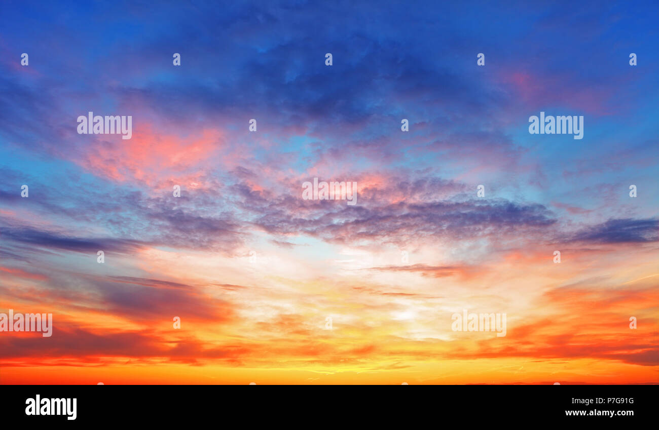 Texture of bright evening sky during sunset Stock Photo - Alamy