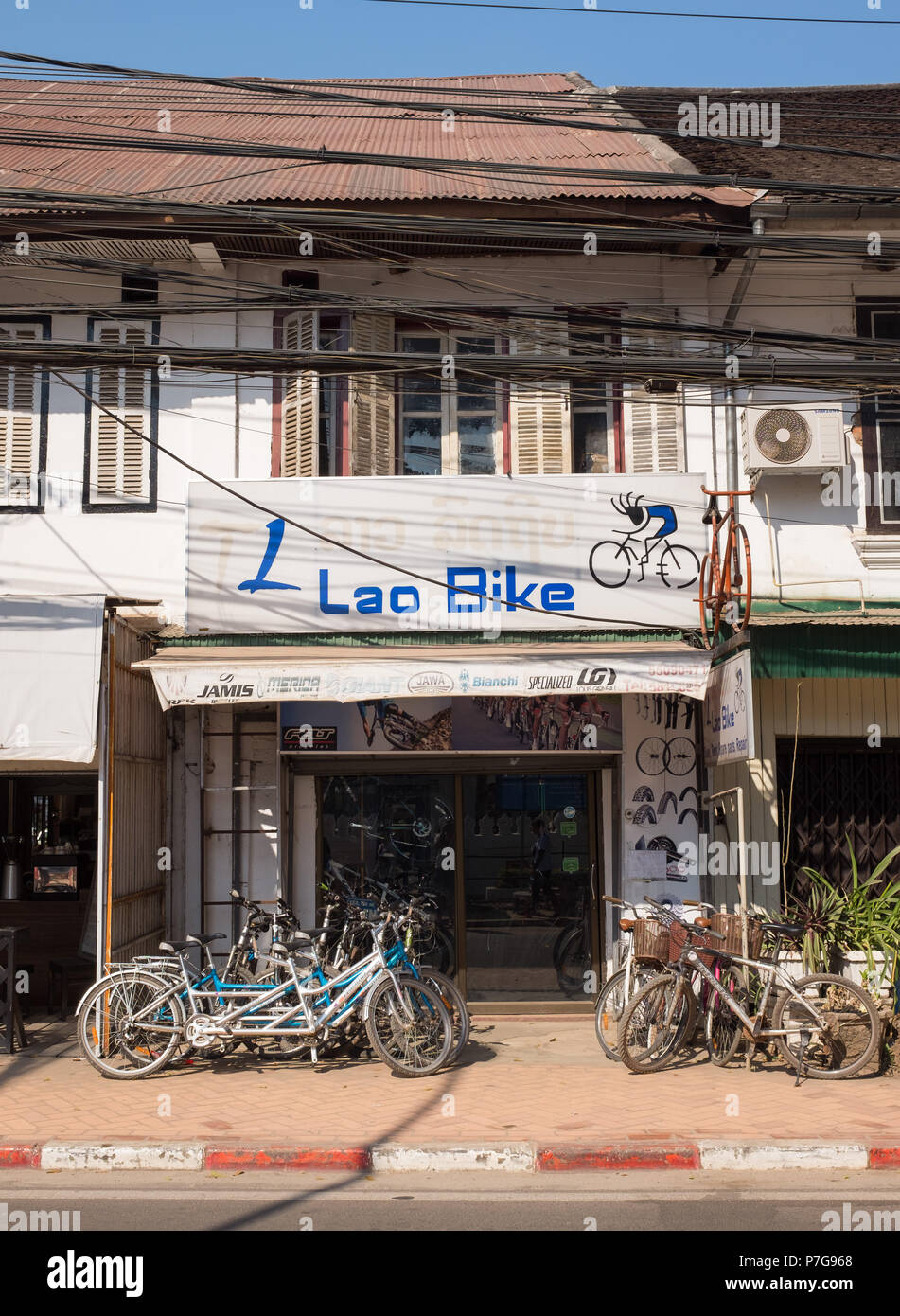 Exterior view of bike shop in Vientiane, Laos, Asia Stock Photo - Alamy