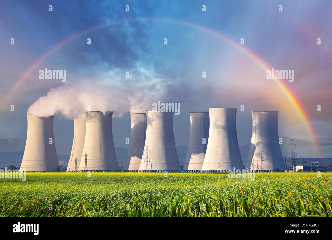Nuclear power plant with summer field Stock Photo - Alamy