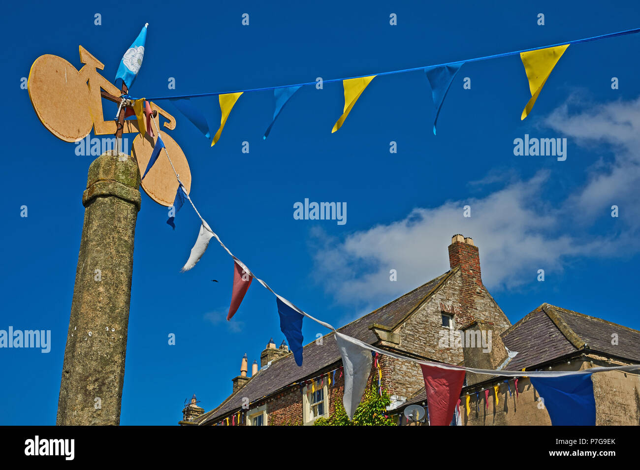 Bunting hanging across the street in the Yorkshire town of Middleham ...