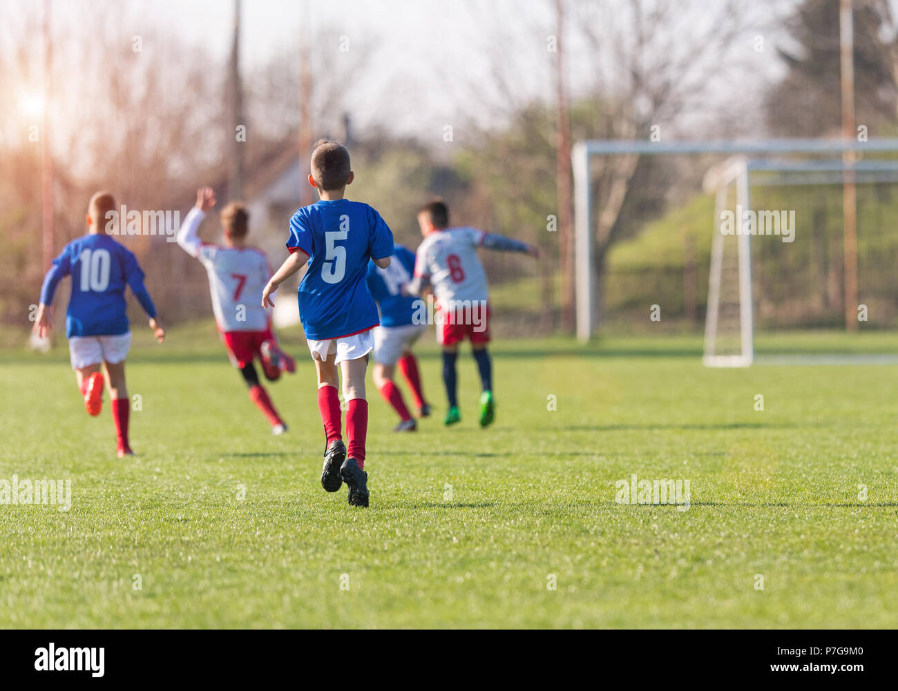 Kids soccer football - small children players exercising before match ...