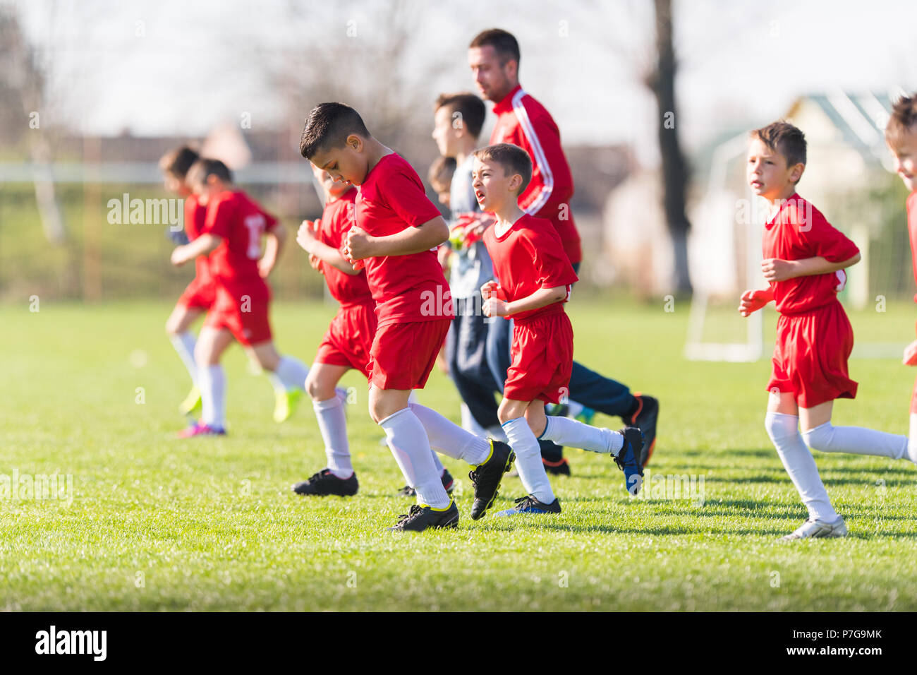 Kids soccer football - small children players exercising before match ...