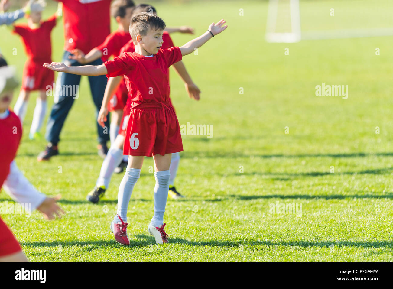Kids soccer football - small children players exercising before match ...