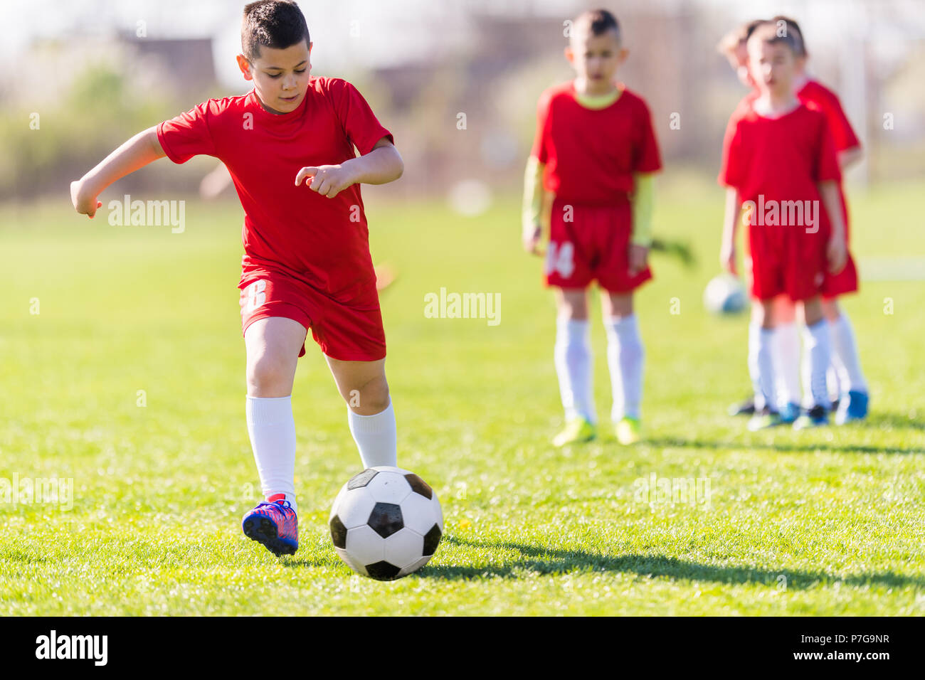 Kids soccer football - young children players match on soccer field ...