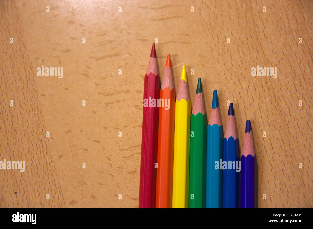 Some pencils of the colors representing the rainbow Stock Photo - Alamy