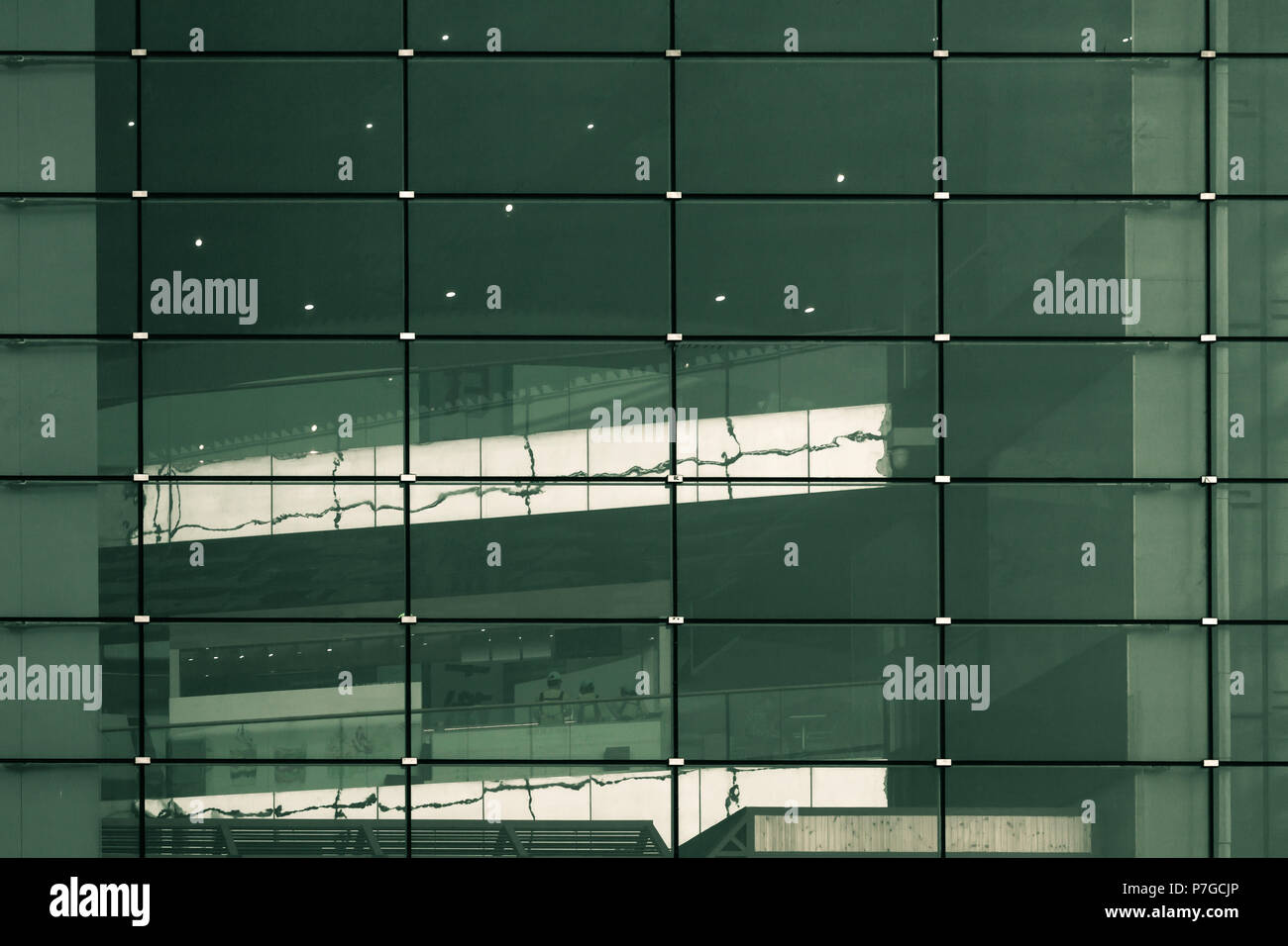 Green Glass Windows of Modern Office Building Stock Photo - Alamy