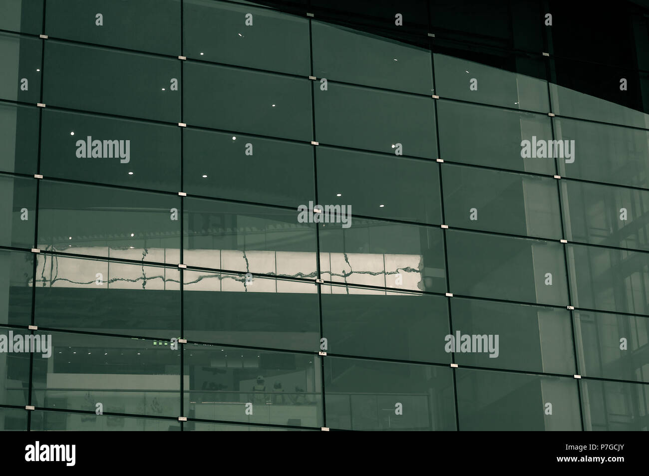 Green Glass Windows of Modern Office Building Stock Photo - Alamy