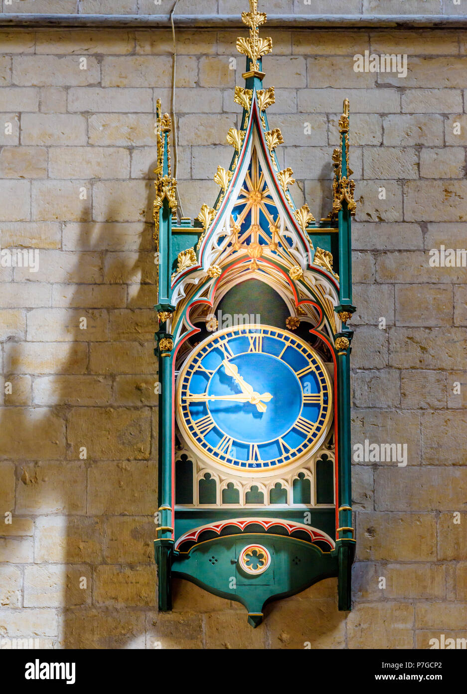 Colorful clock mounted on the wall of the north transept at the ...