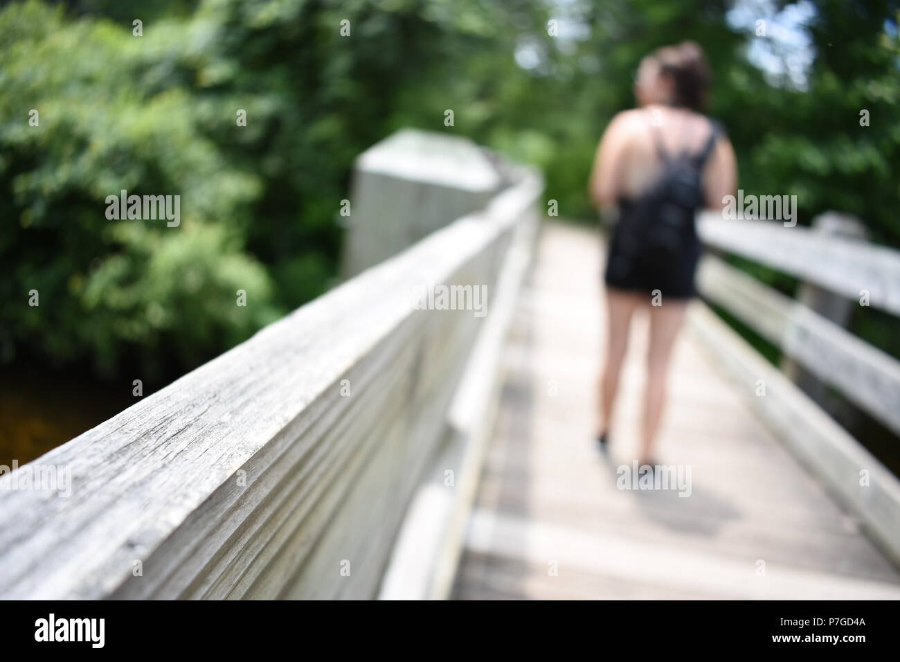 Girl On A Bridge Stock Photo - Alamy