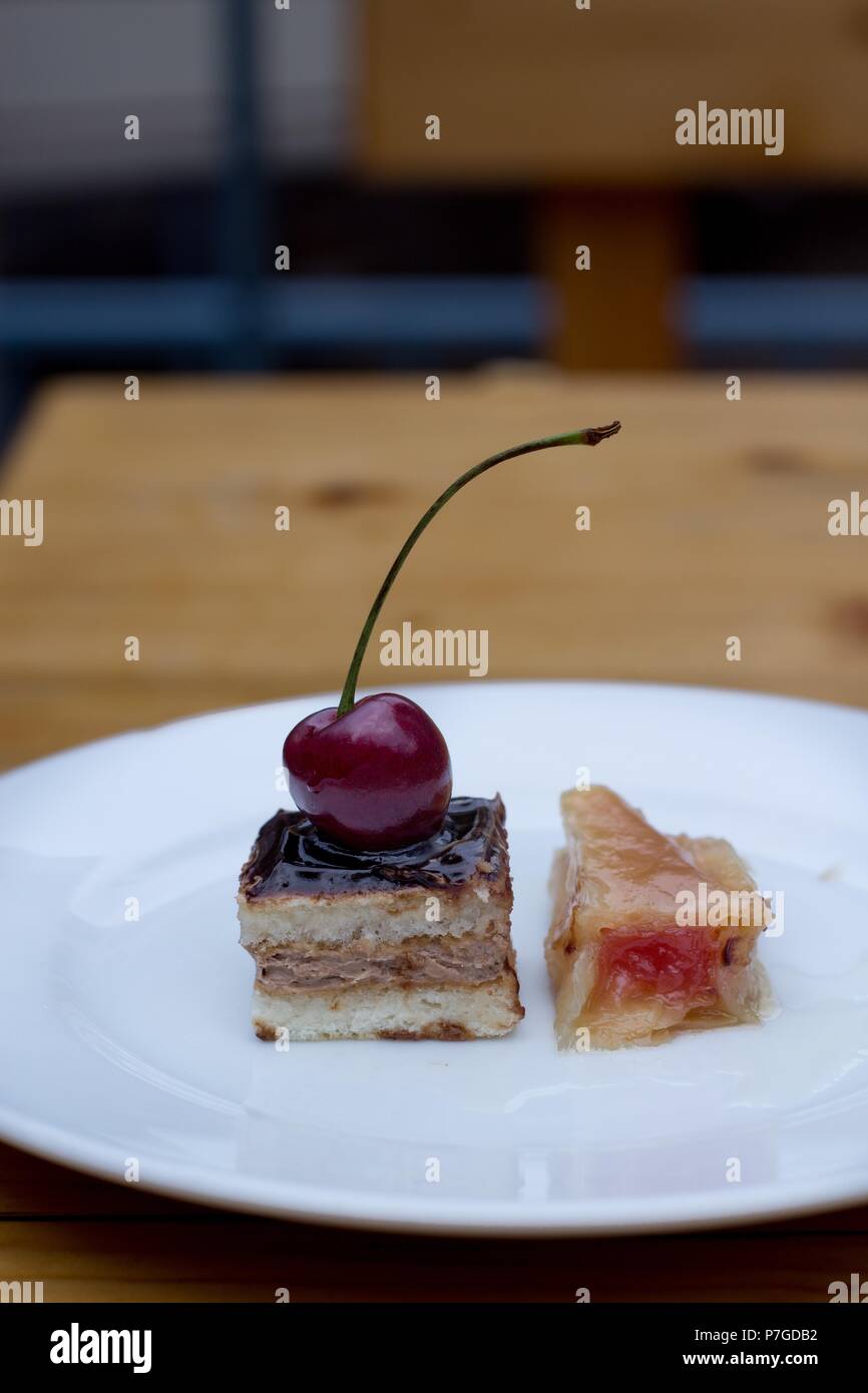 traditional bulgarian sweets - rose baklava and cake with cherry Stock ...