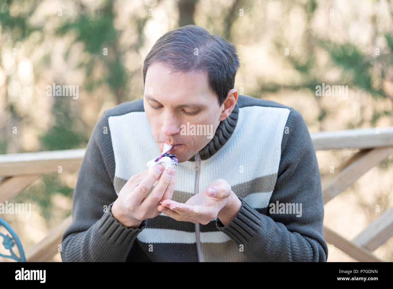 Man stretching while sitting on chair hi-res stock photography and ...