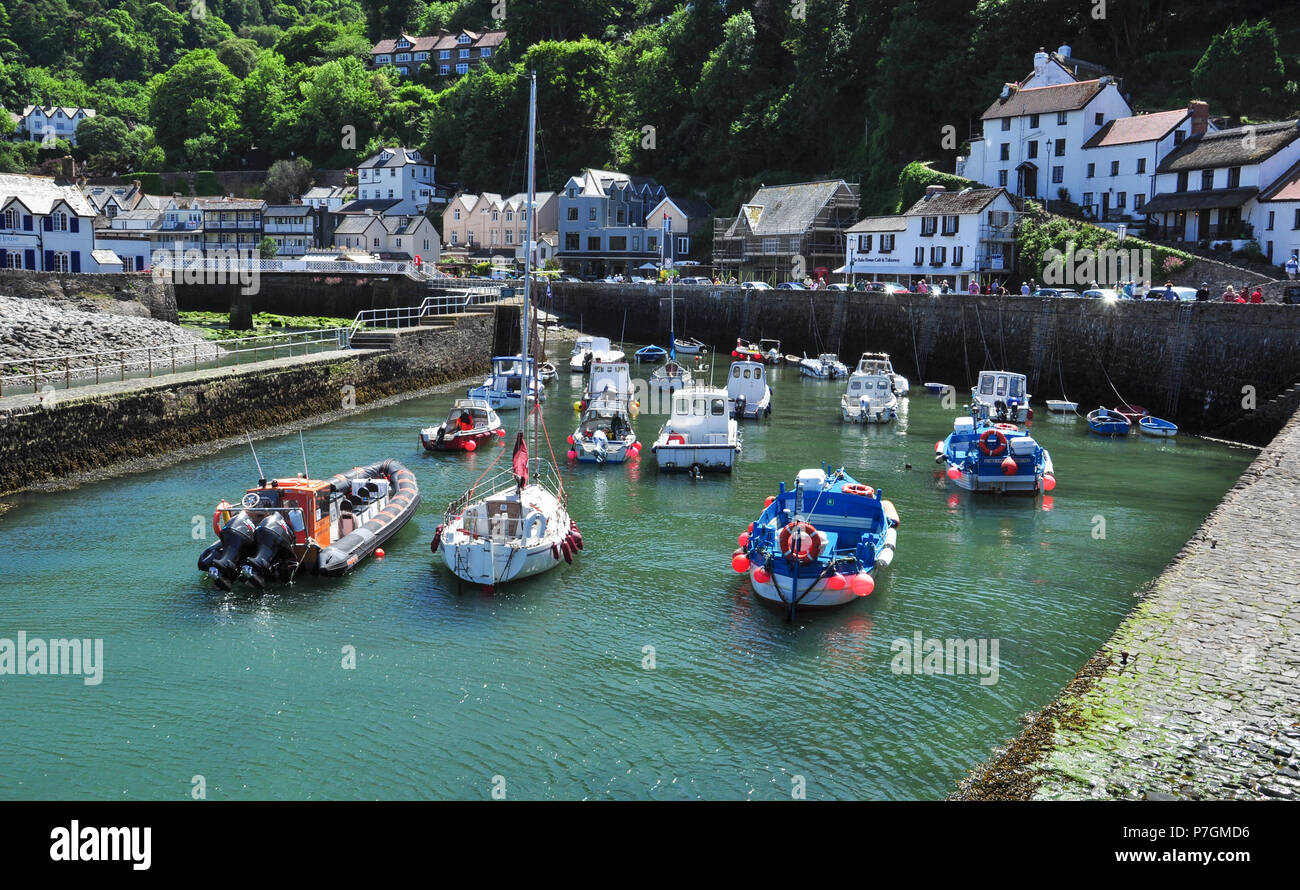 Boats in the small harbour and surrounding buildings, Lynmouth, North ...
