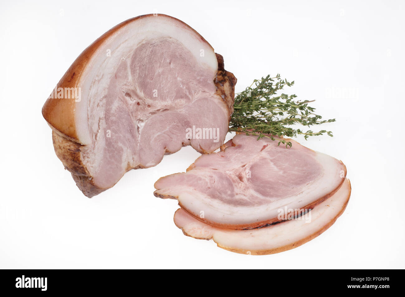 Pieces of ham on an isolated tudio background Stock Photo - Alamy